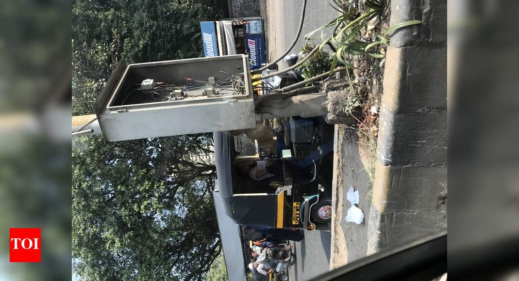 open junction box in middle of road - Times of India