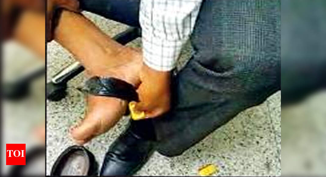 Smuggling gold biscuits in shoes: Man held at airport | Hyderabad News ...