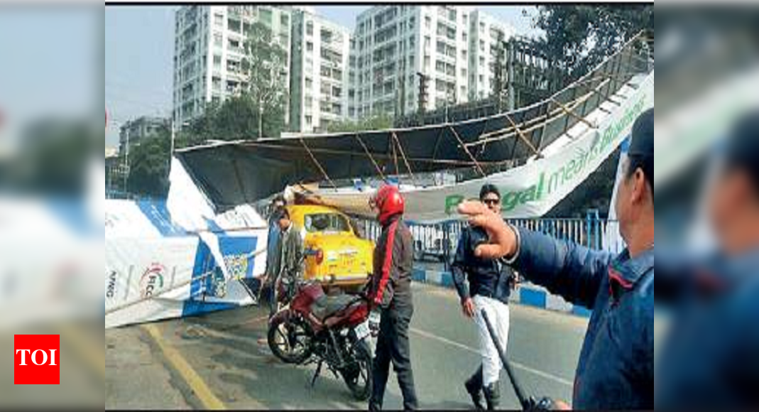 Ad hoarding on Gariahat flyover falls on pedestrian | Kolkata News ...