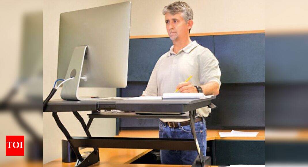 Companies ask staff to stretch at work, stand up and take note - Times ...