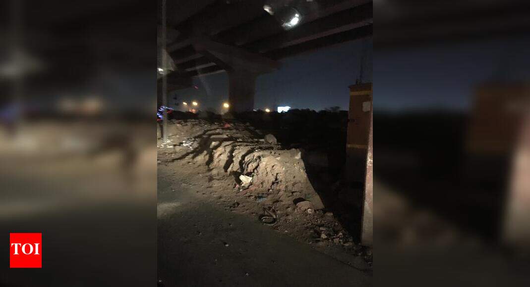 dumping ground below JVLR flyover - Times of India