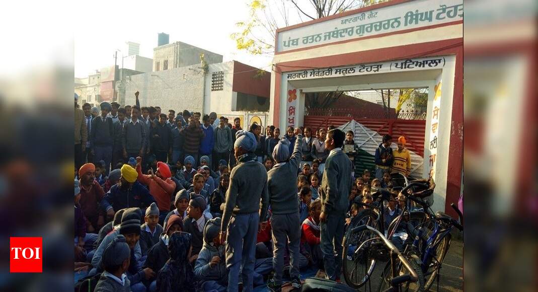 Students protest action against school staff over caste discrimination ...