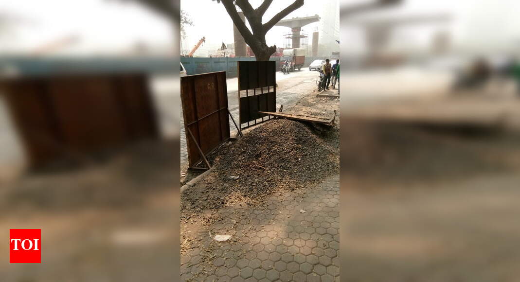 unsafe footpath - Times of India