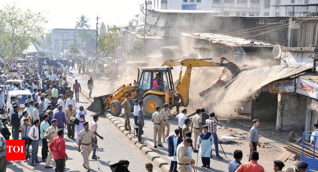 SMC sets lofty target of slum-free Surat | Surat News - Times of India