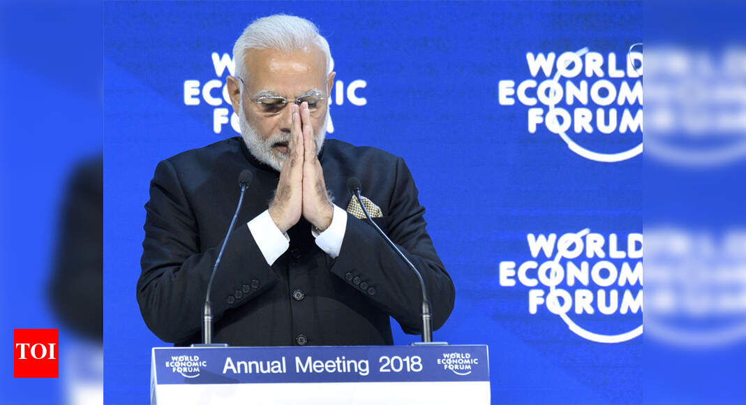 Modi In Davos: India is replacing red tape with red carpet: PM Modi ...