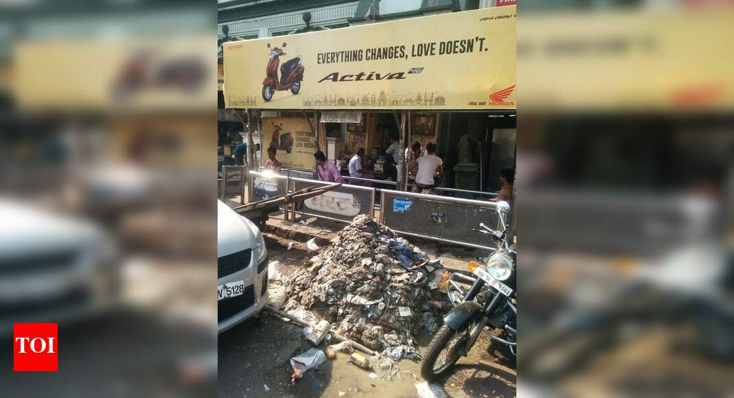 Garbage at phydhonie bus stop - Times of India