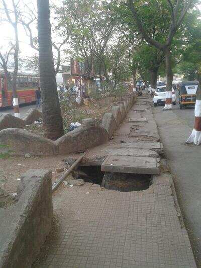Bad condition of footpath near teen hat naka,Thane - Times of India
