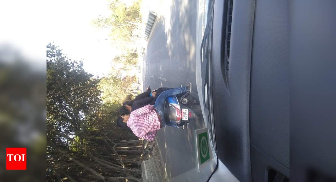 Unsafe triple riding without hemet - Times of India