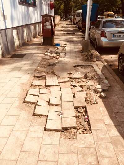 public footpath in bad shape - Times of India