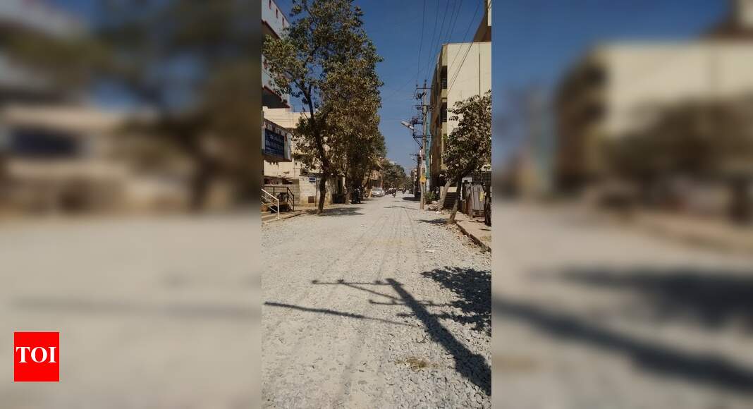 Tarring of road - Times of India