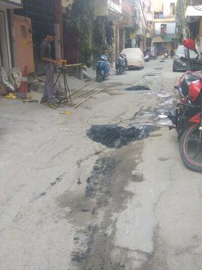 Silt lying on the road - Times of India