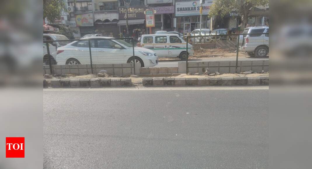 Increasing the height of central verge - Times of India