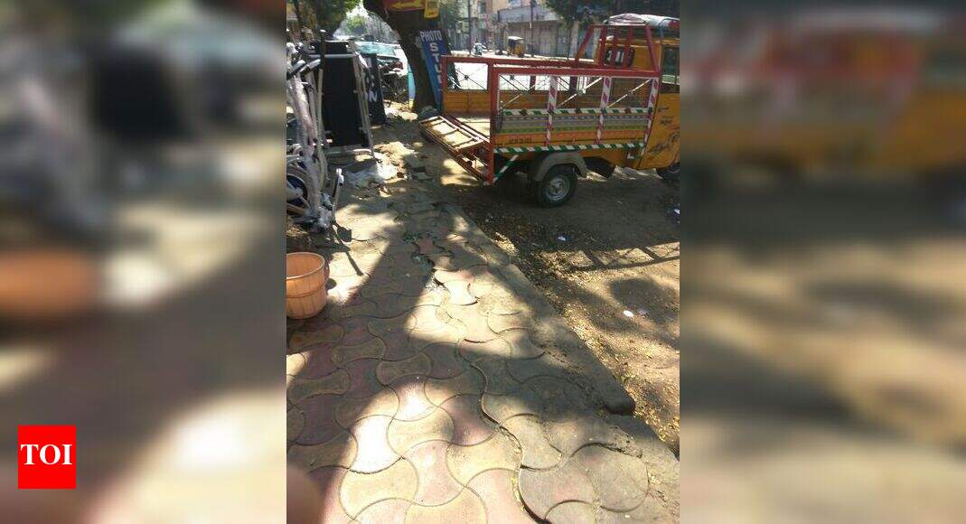 Footpath occupied by Traders - Times of India