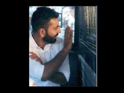 Md Haris smiles at cops, walks into police station | Bengaluru News ...