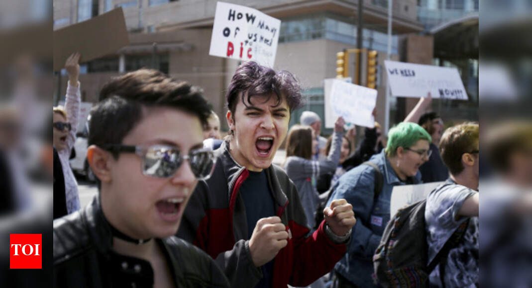 Students under political attack after shooting as Trump signals changes ...