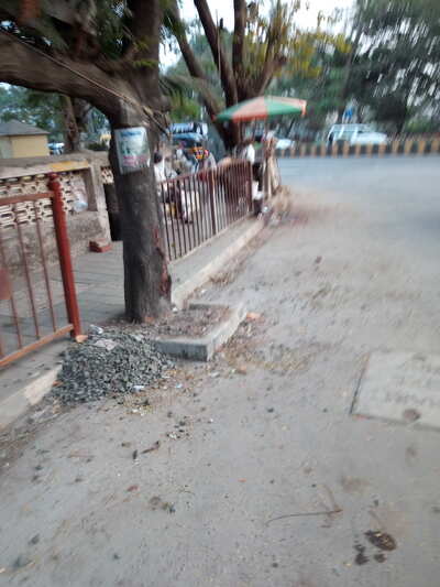 Blocking of Footpath Corner by Tea Stall - Times of India