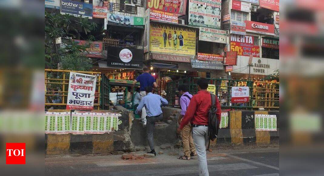 Noida Sector 18 Median: Noida Sector 18 median sealed but breaches back ...