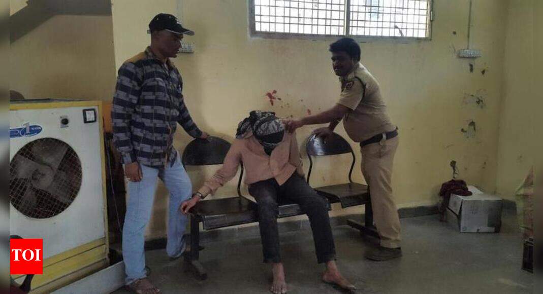 Drama at Lalgunj as goon fires at cops | Nagpur News - Times of India