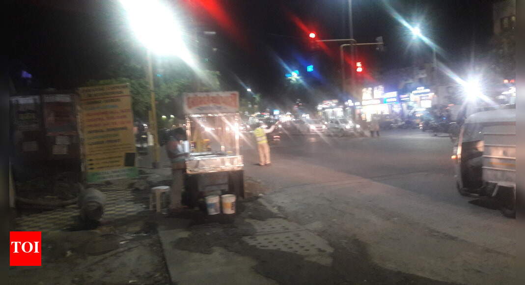 newly constructed footpath blocked by stall - Times of India
