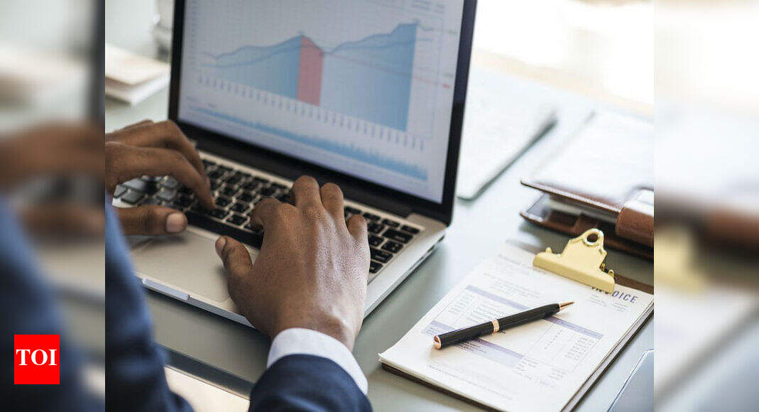 Genpact links top bosses' pay to digital revenue - Times of India