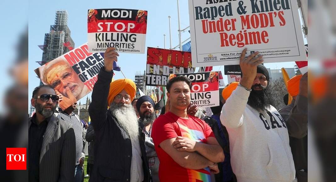 Modi in London: Demonstrations turn aggressive as Indian tricolour ...