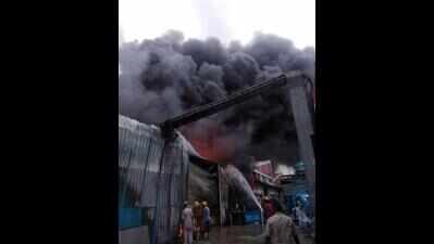 Slum, factory destroyed in fires | Noida News - Times of India