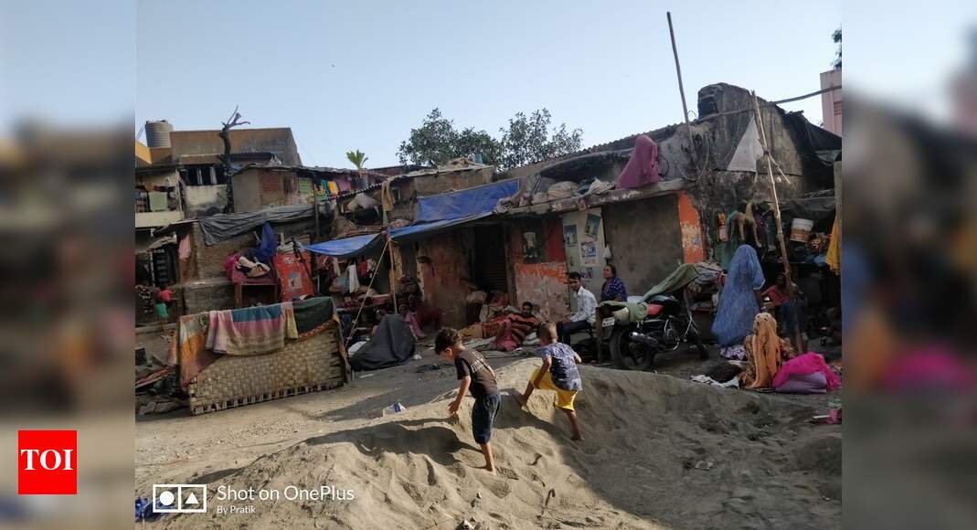 Space eaten up by Slums , multiplying continuously - Times of India