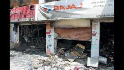 Three-storey building near Gotri pond gutted in fire | Vadodara News ...