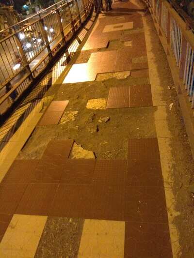 Civic Apathy-Broken footpath pavements - Times of India