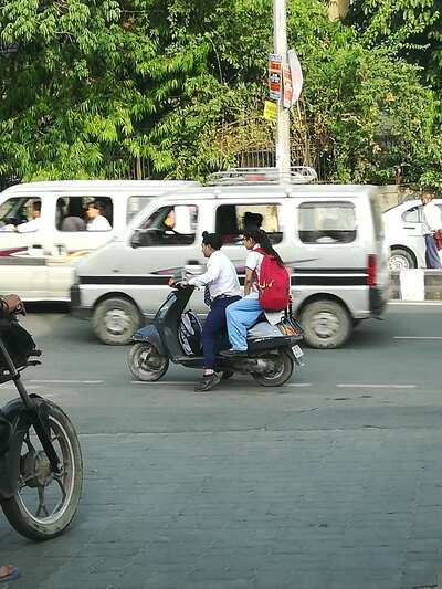 Schoolboy riding two-wheeler - Times of India