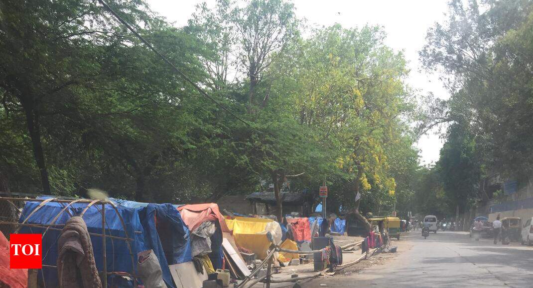 Encroachment on main road - Times of India
