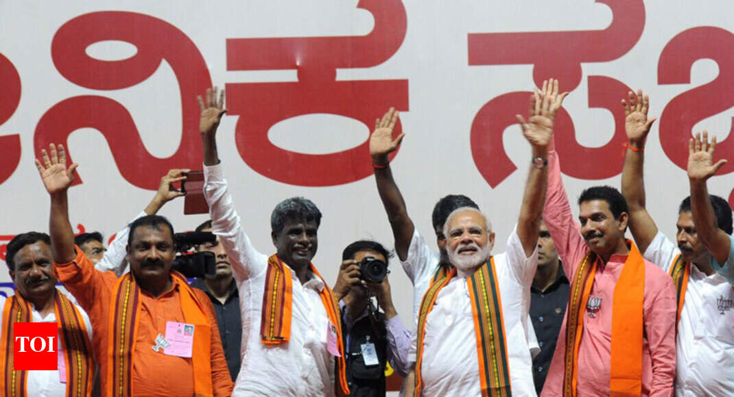 PM Modi hits out at Congress nepotism, debunks theory of hung assembly | India News - Times of India