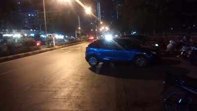 Car parked, blocking the road - Times of India