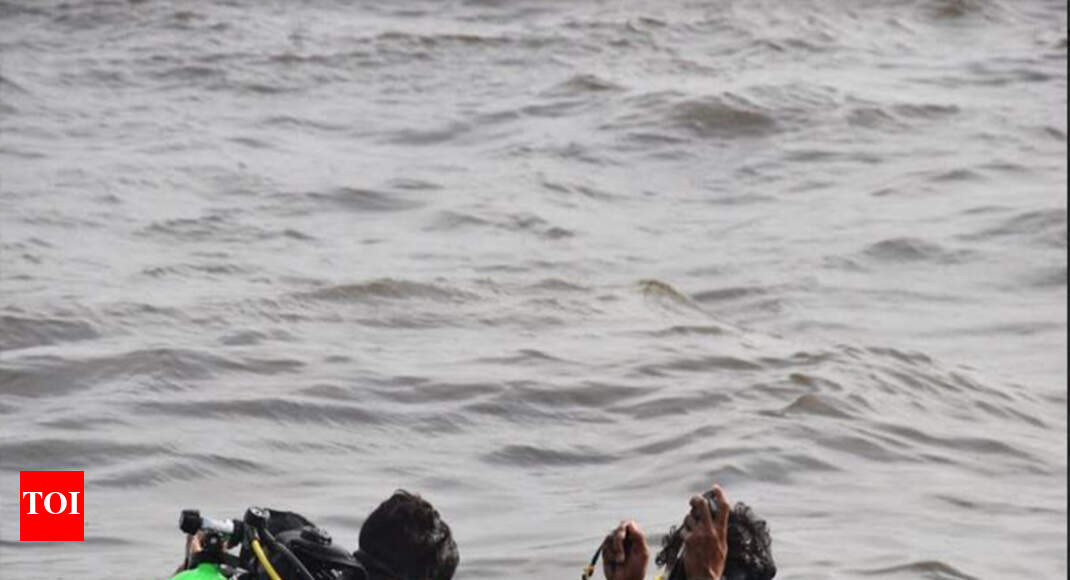 versova beach clean up: Trained divers dive into world’s largest marine litter cleanup in ...