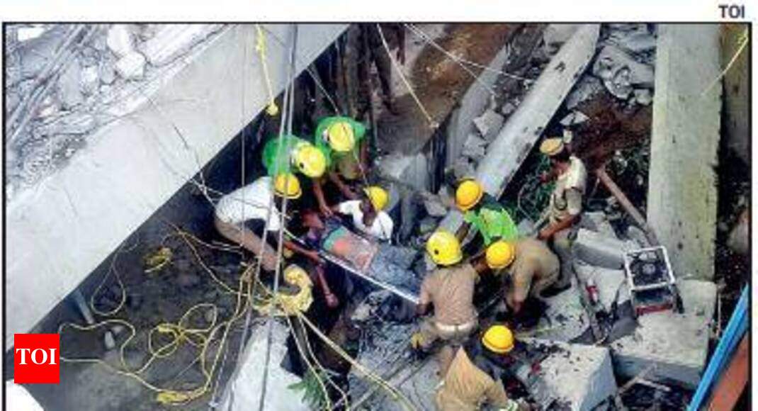 Two workers die as building collapses: Two workers die as precast slab ...