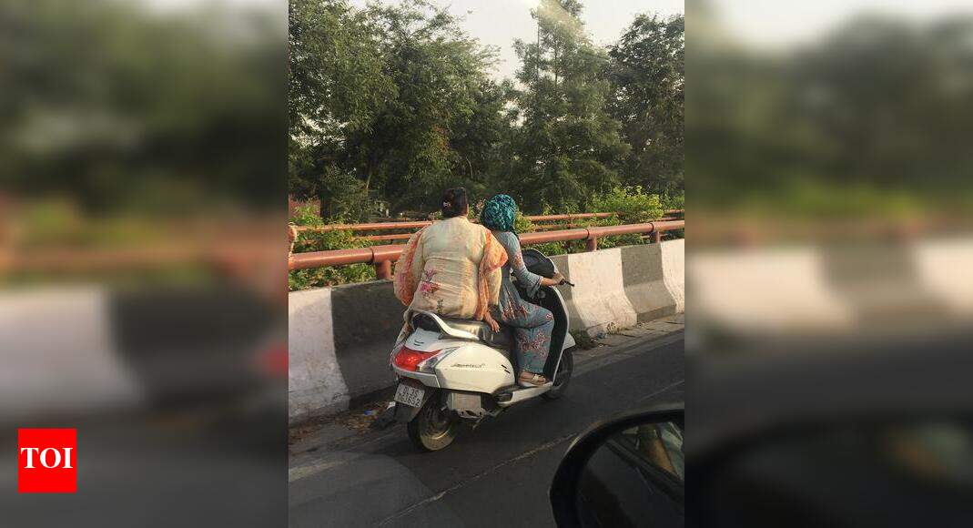 Helmetless two-wheeler riders - Times of India
