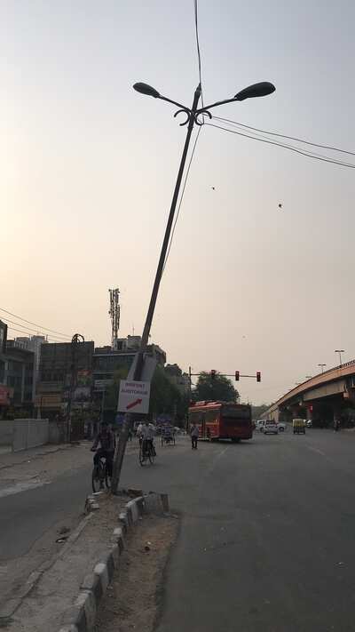 Leaning light pole - Times of India