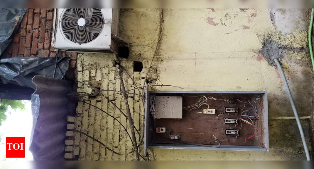 unsafe exposed electric meter and cables - Times of India