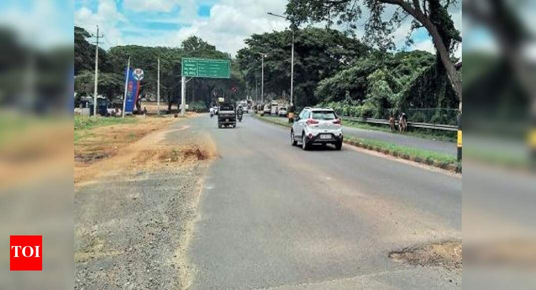 Commuters face ordeal on Hunsur Road | Mysuru News - Times of India