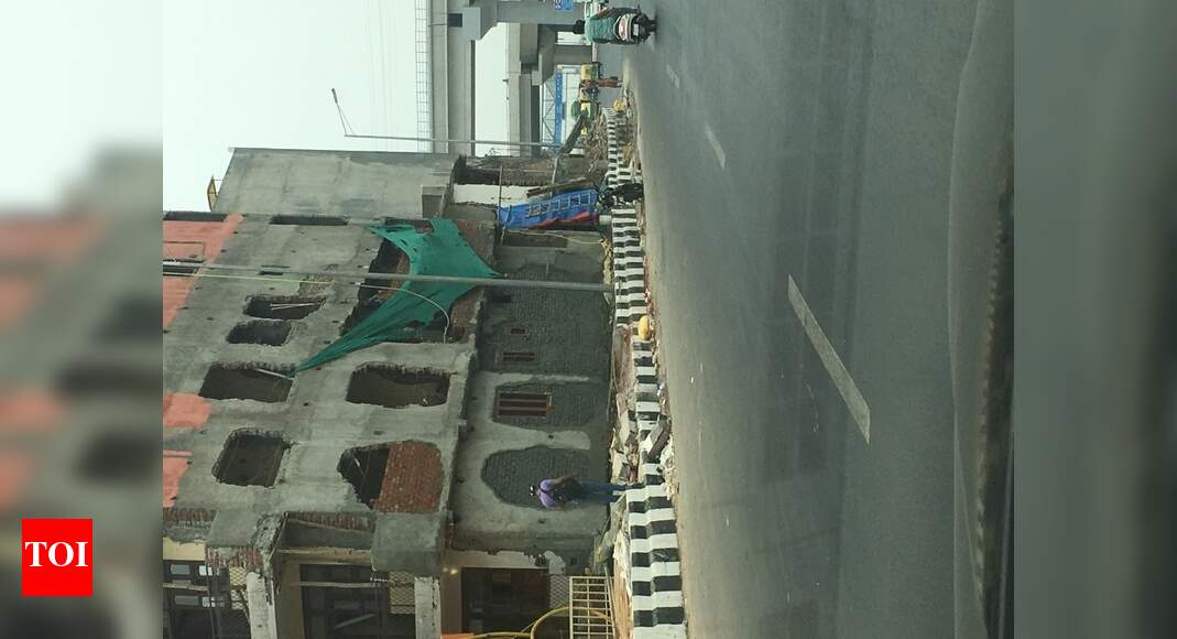 encroachment on NH24 - Times of India