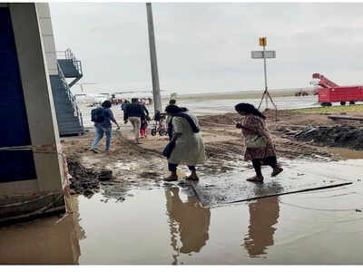 Muck: Muck, water welcome flyers at Surat airport | Surat News - Times ...