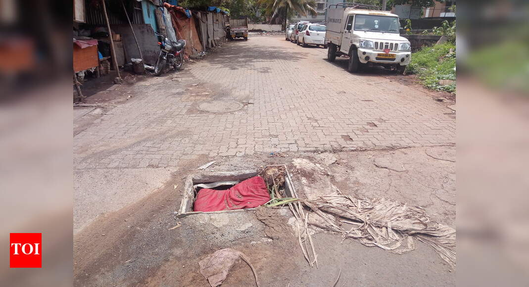 Open Manhole - Times of India
