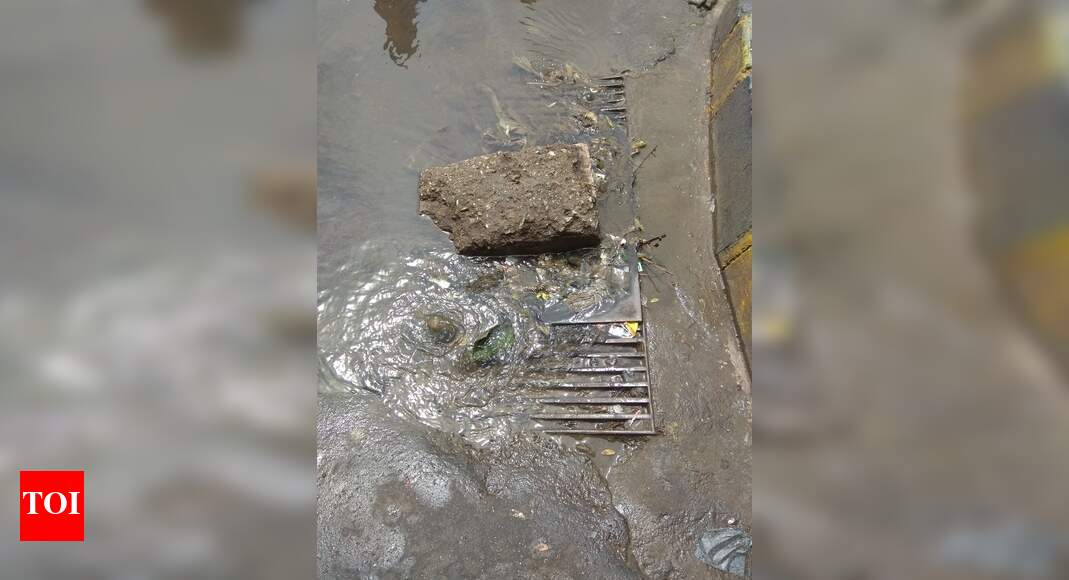 Monsoon water overflowing from storm drain - Times of India