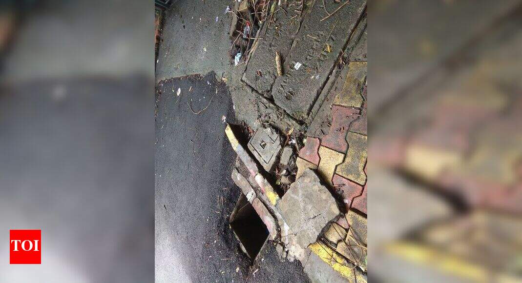OPEN GUTTER NEAR ORLEM BUS STOP - Times of India