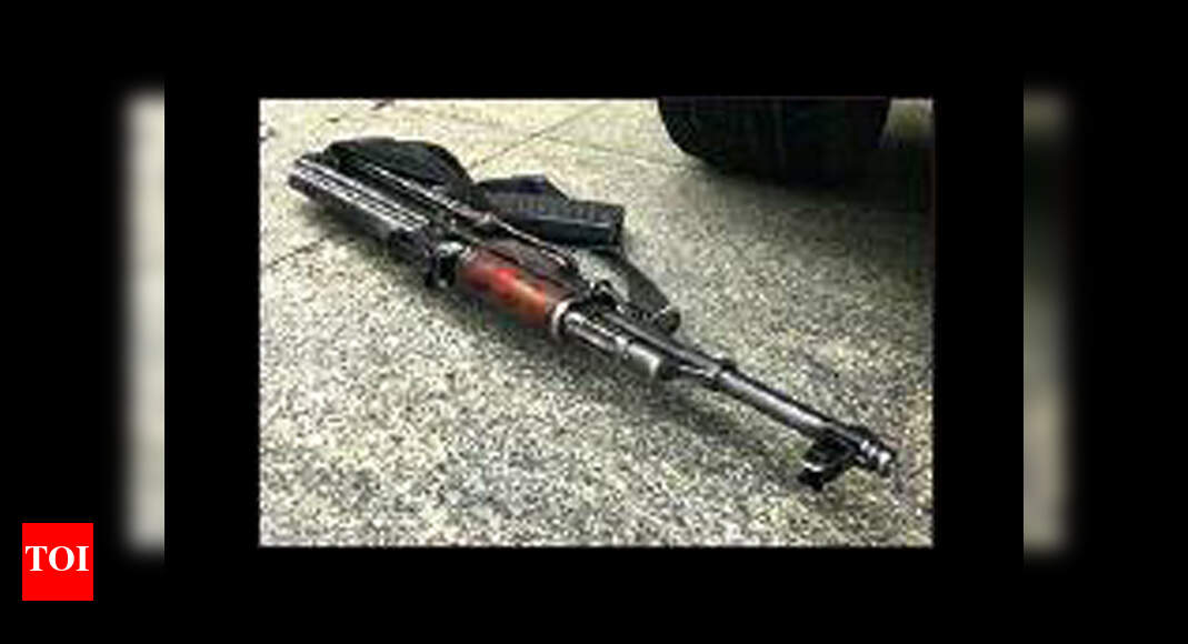 Cop turns AK-47 on self, escapes death | Hyderabad News - Times of India