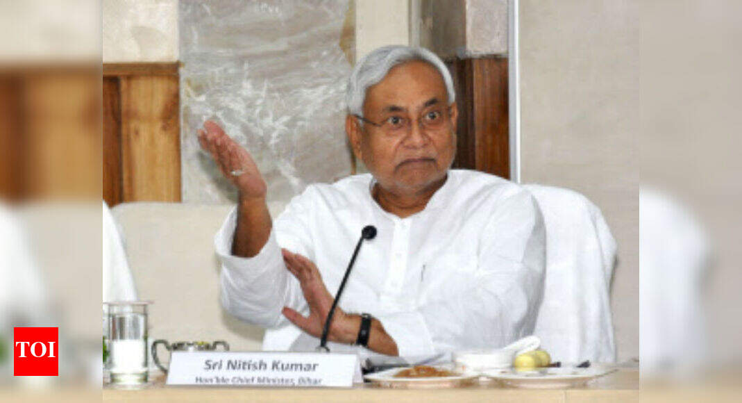 Bihar CM Nitish slams MP Giriraj for meeting rioters | India News - Times of India