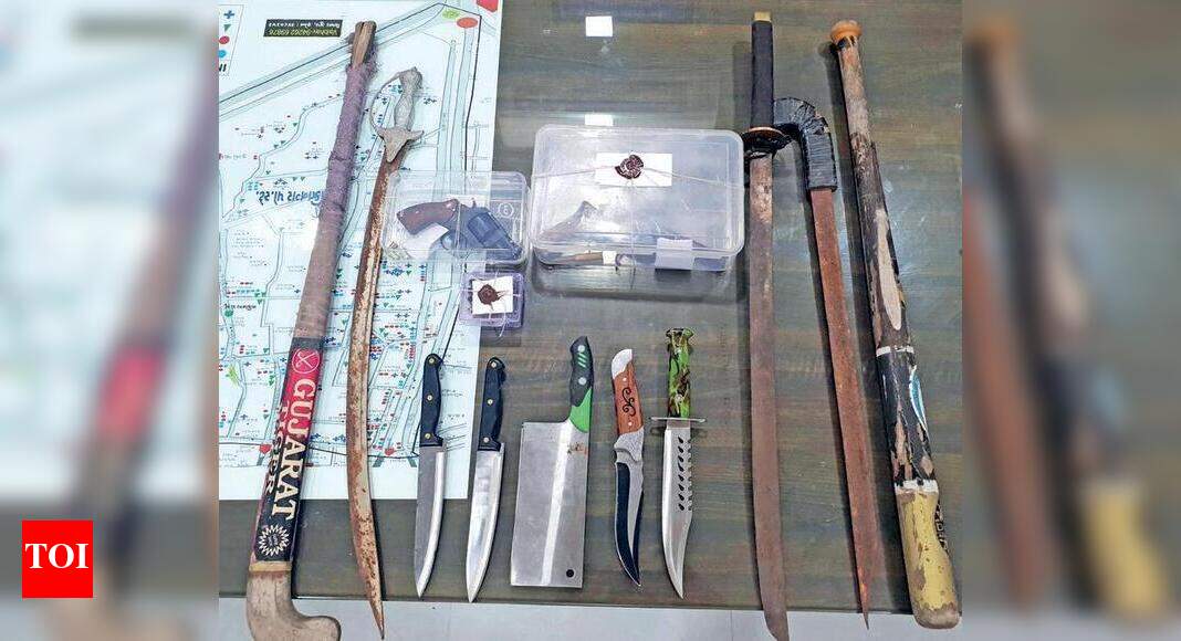 Two held with weapons from Bapunagar slums | Rajkot News - Times of India