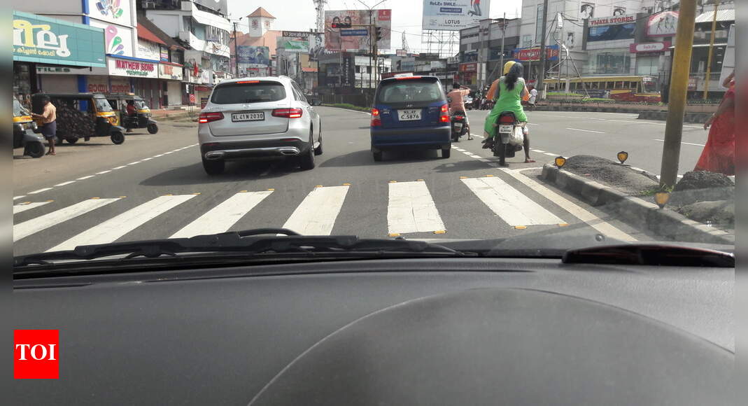 Crossing over zebra crossing. Traffic violation - Times of India