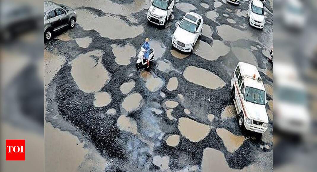 Take a ride on potholed roads, activists ask CM | Navi Mumbai News ...