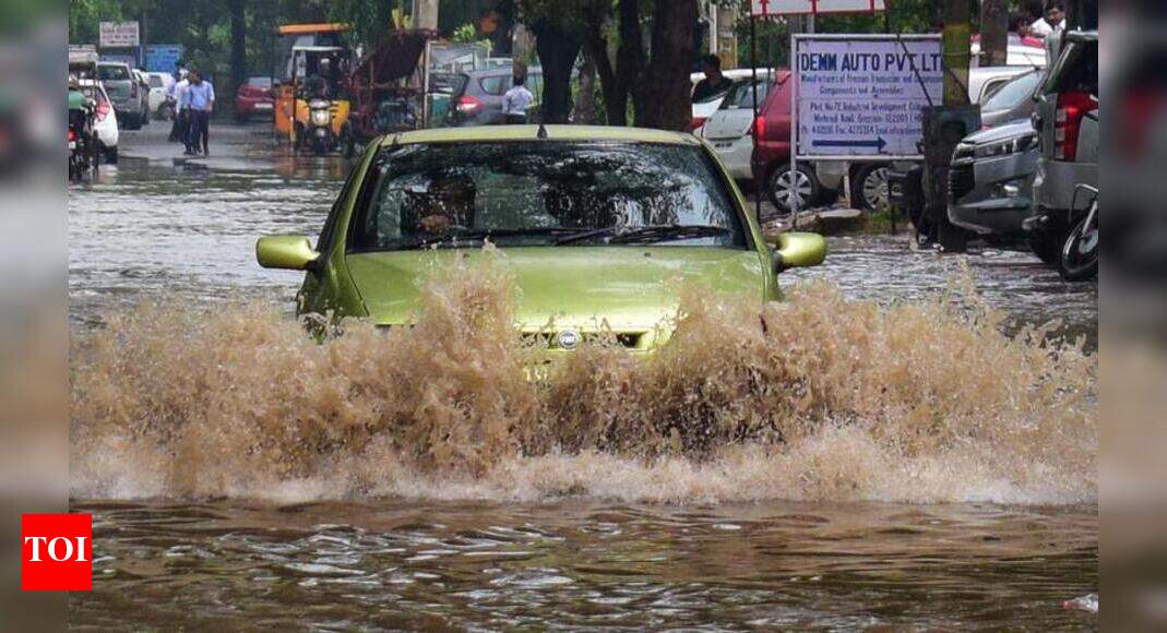 Drains choked, rain revives flooding fears | Gurgaon News - Times of India